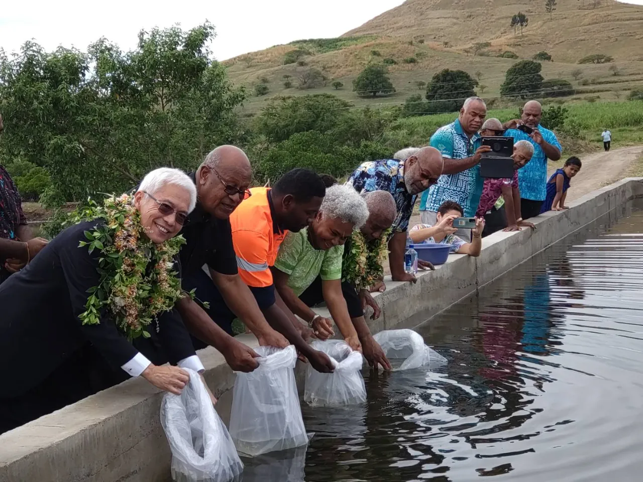 Representative Joseph Chow and Hon. Kalaveti Ravu, Minister for ...